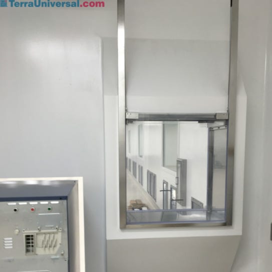 Pass-through Vertical Sliding Convenience Windows | Terra Universal